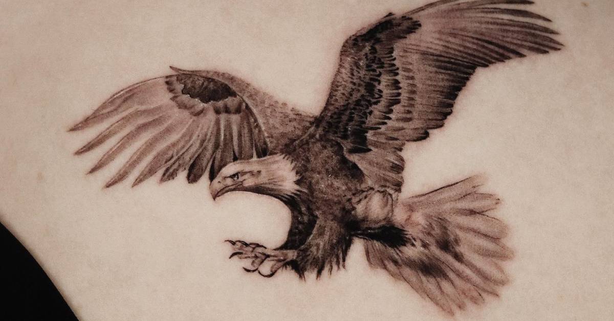 Micro-realistic style eagle tattoo located on the