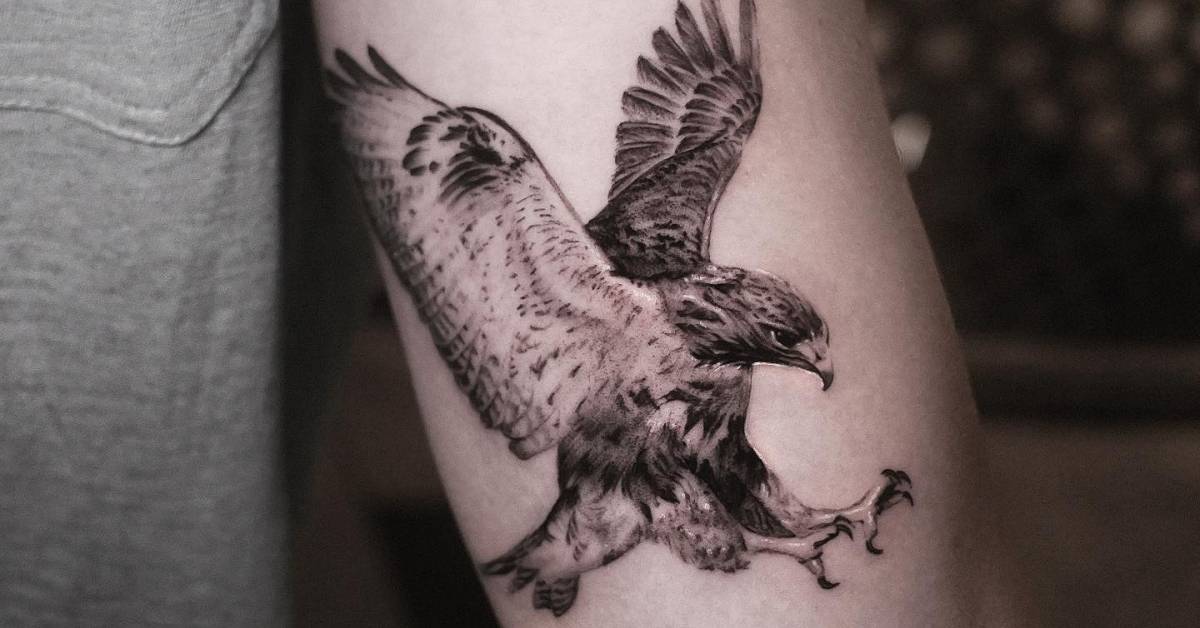 Eagle tattoo done in micro-realistic style, located on