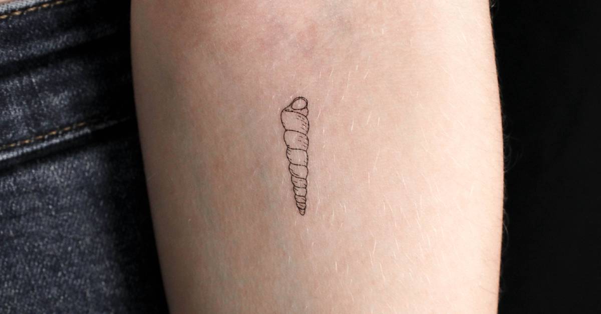 Fine line style auger shell temporary tattoo done on