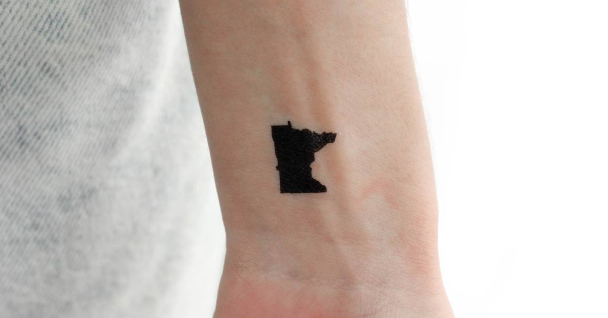 Minnesota map temporary tattoo located on the wrist.