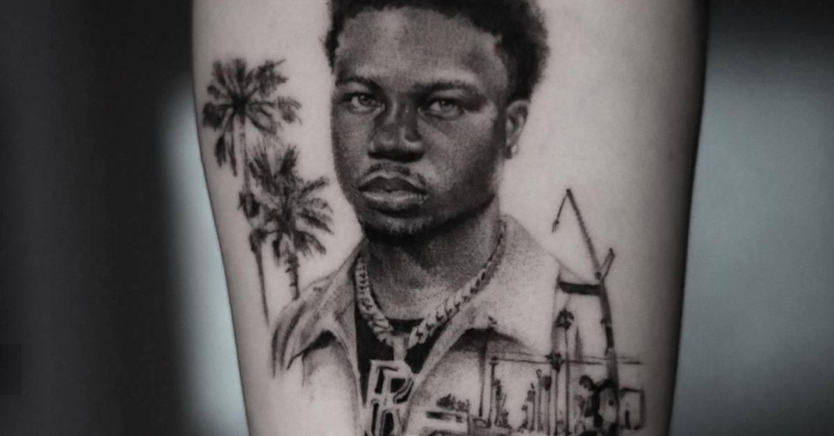 Roddy Ricch portrait tattoo located on the inner arm,