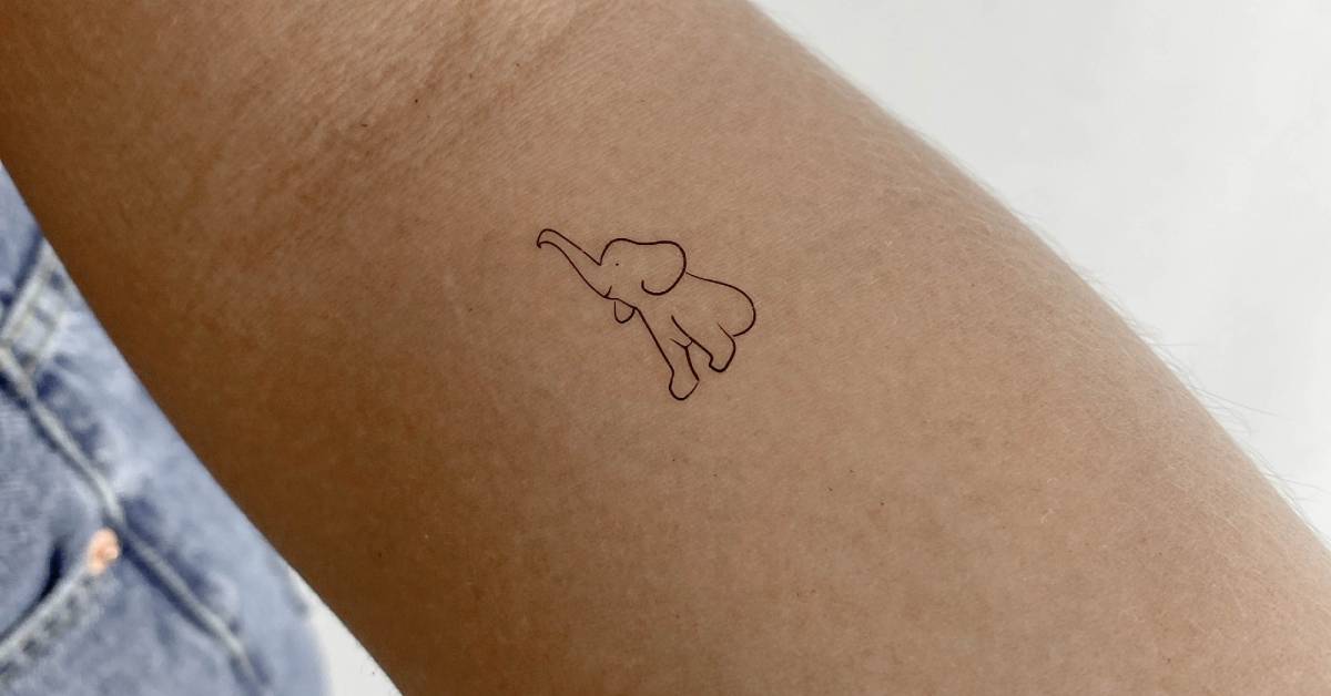 Fine line style sitting elephant temporary tattoo