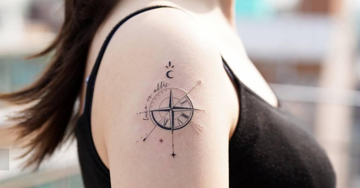 Compass rose tattoo located on the upper arm.