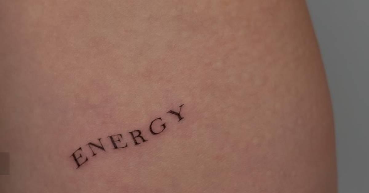 Lettering tattoo of the word "energy" located on the