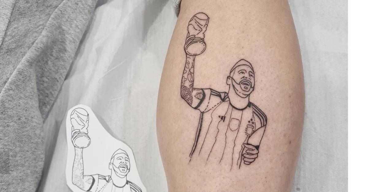 Messi tattoo located on the calf, fine line style.