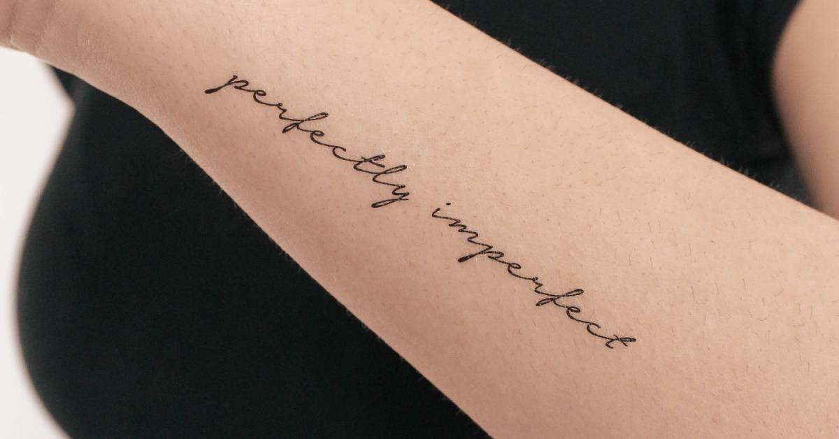 "Perfectly imperfect" temporary lettering tattoo