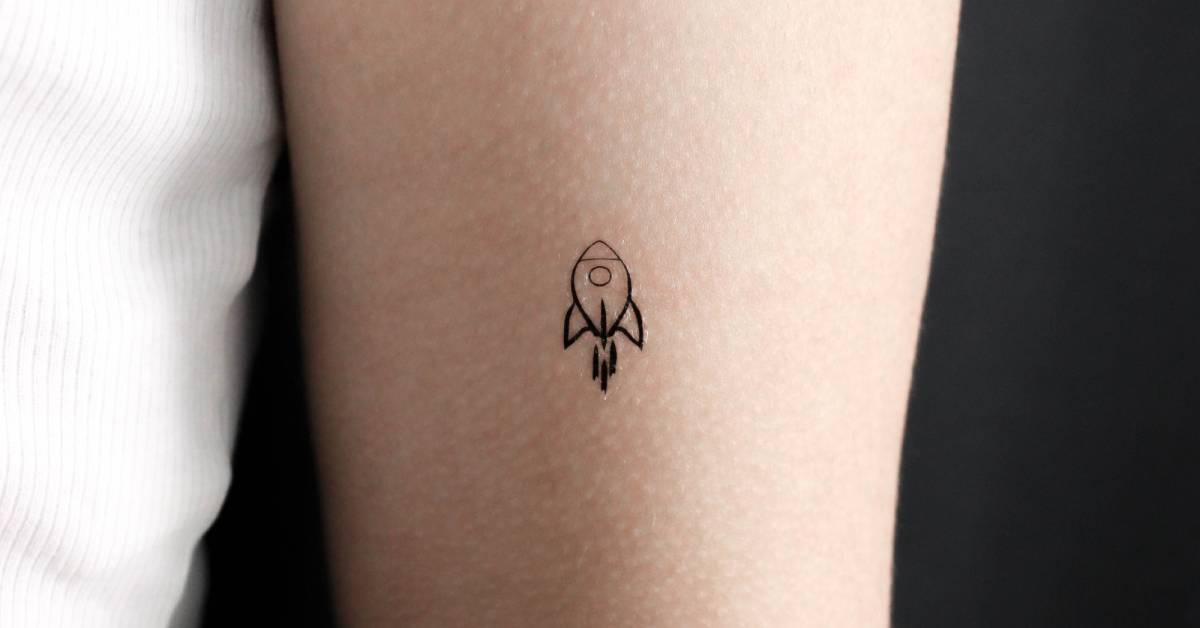 Minimalistic style rocket temporary tattoo placed on