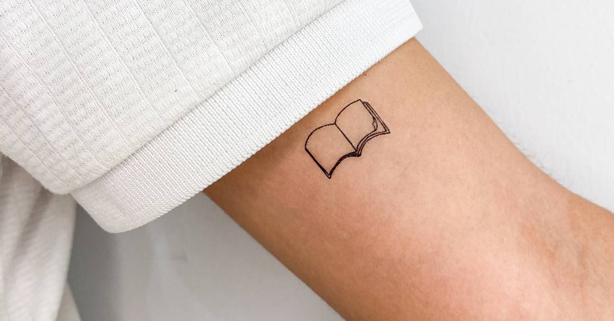 Minimalist book temporary tattoo located on the inner