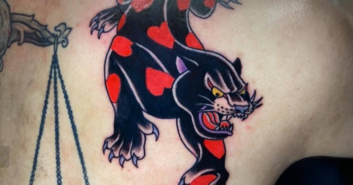 Heart panther tattoo located on the shoulder blade,