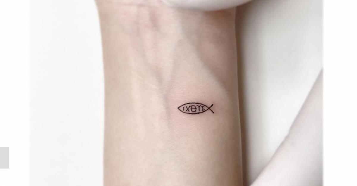 Minimalistic style Jesus fish tattoo located on the