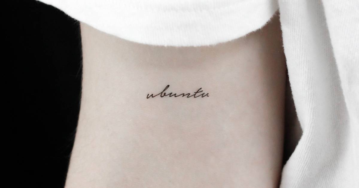 "Ubuntu" temporary lettering tattoo done on the bicep.