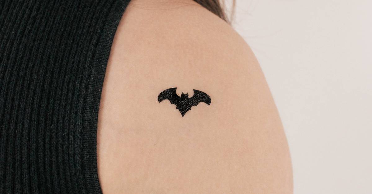 Minimalistic style bat temporary tattoo located on the