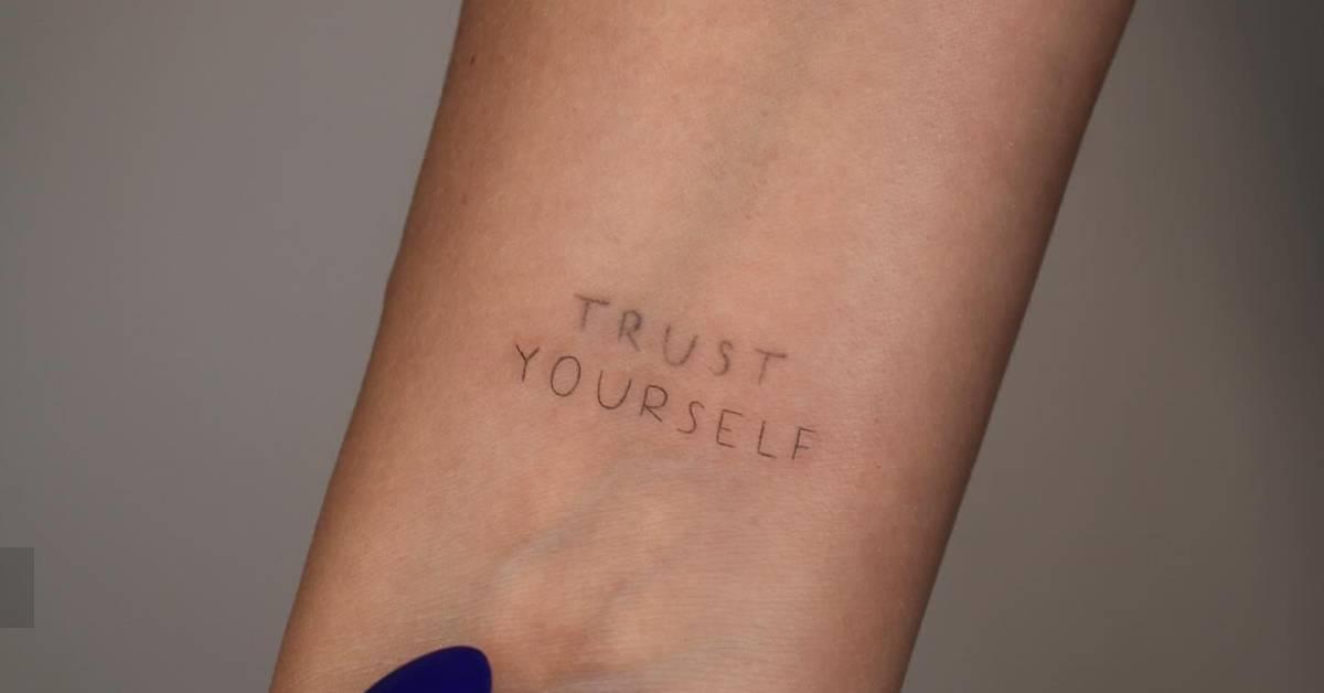 "Trust (healed) yourself (fresh)" lettering tattoo