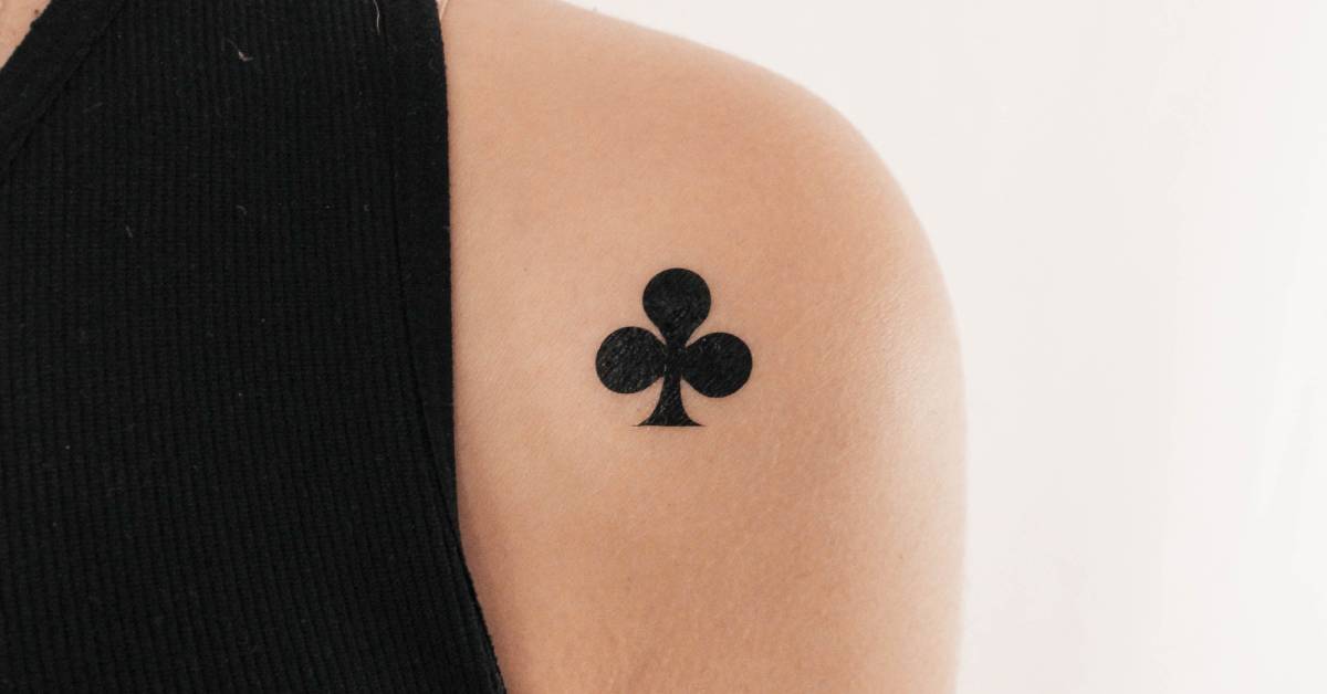 Minimalistic style clubs suit temporary tattoo located