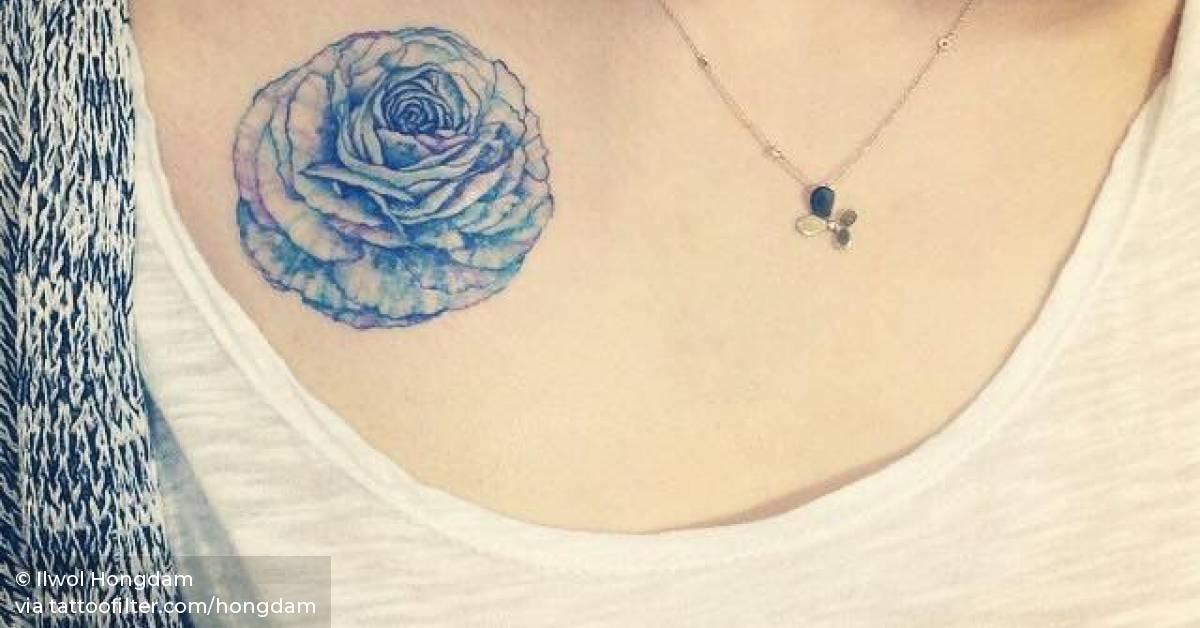 Ranunculus tattoo on the chest.