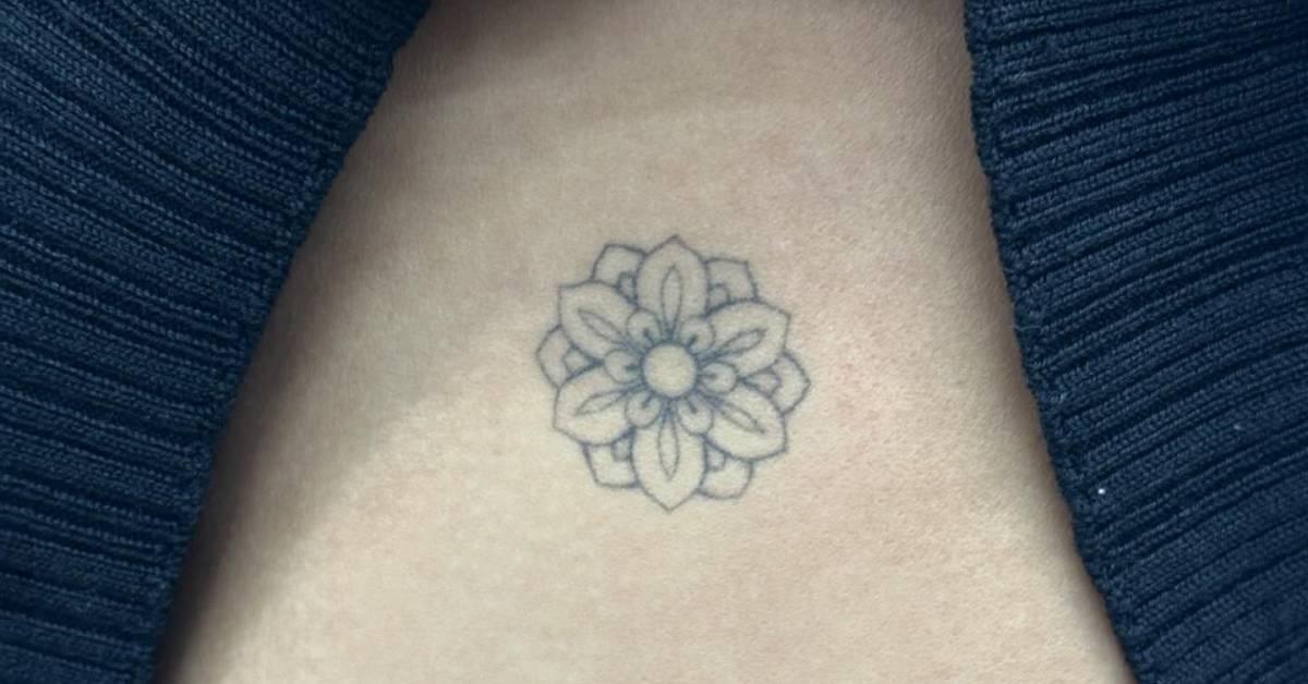 Healed mandala tattoo located on the rib.