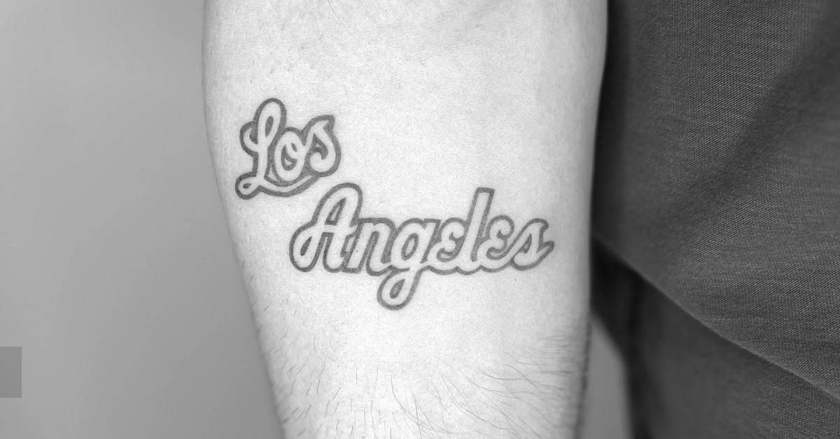 "Los Angeles" lettering tattoo located on the inner