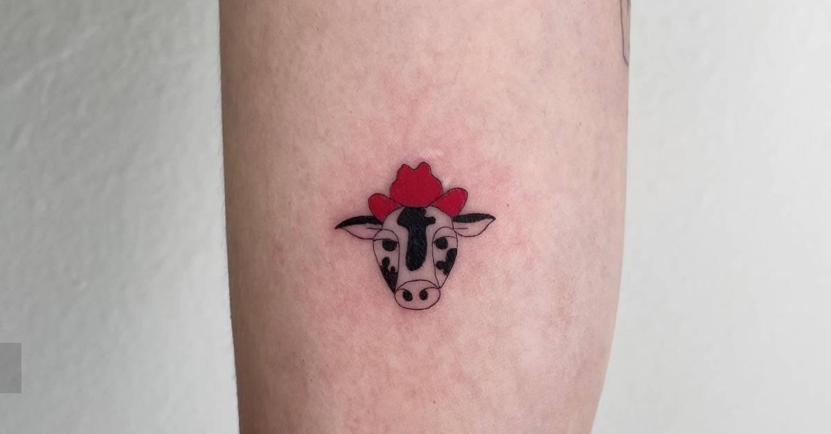 Cow tattoo done on the inner arm.