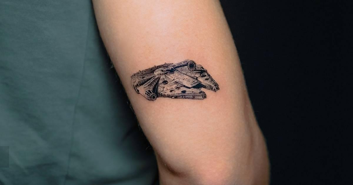 Micro-realistic style Millennium Falcon tattoo located