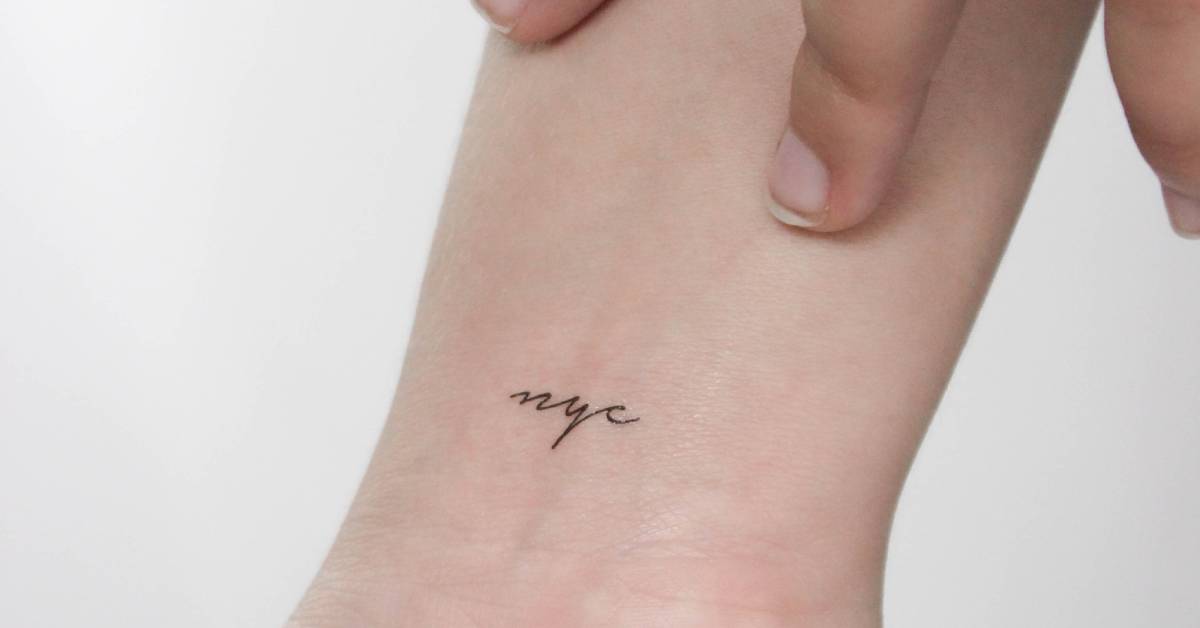 Handwritten lowercase "nyc" temporary tattoo