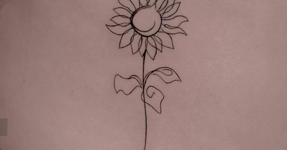 Fine line style sunflower tattoo located on the waist.