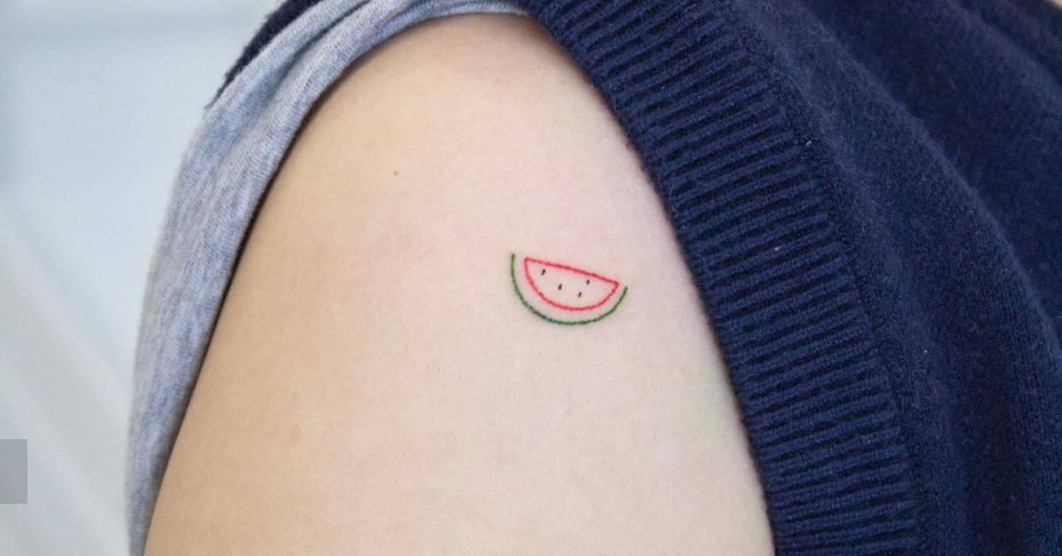 Minimalistic style watermelon tattoo located on the
