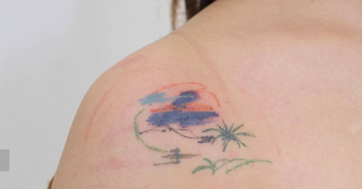 Abstract landscape tattoo located on the shoulder,
