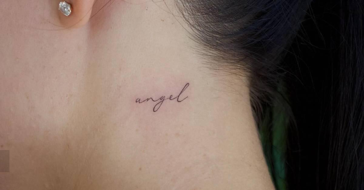Lettering tattoo of the word "angel" handwritten on the