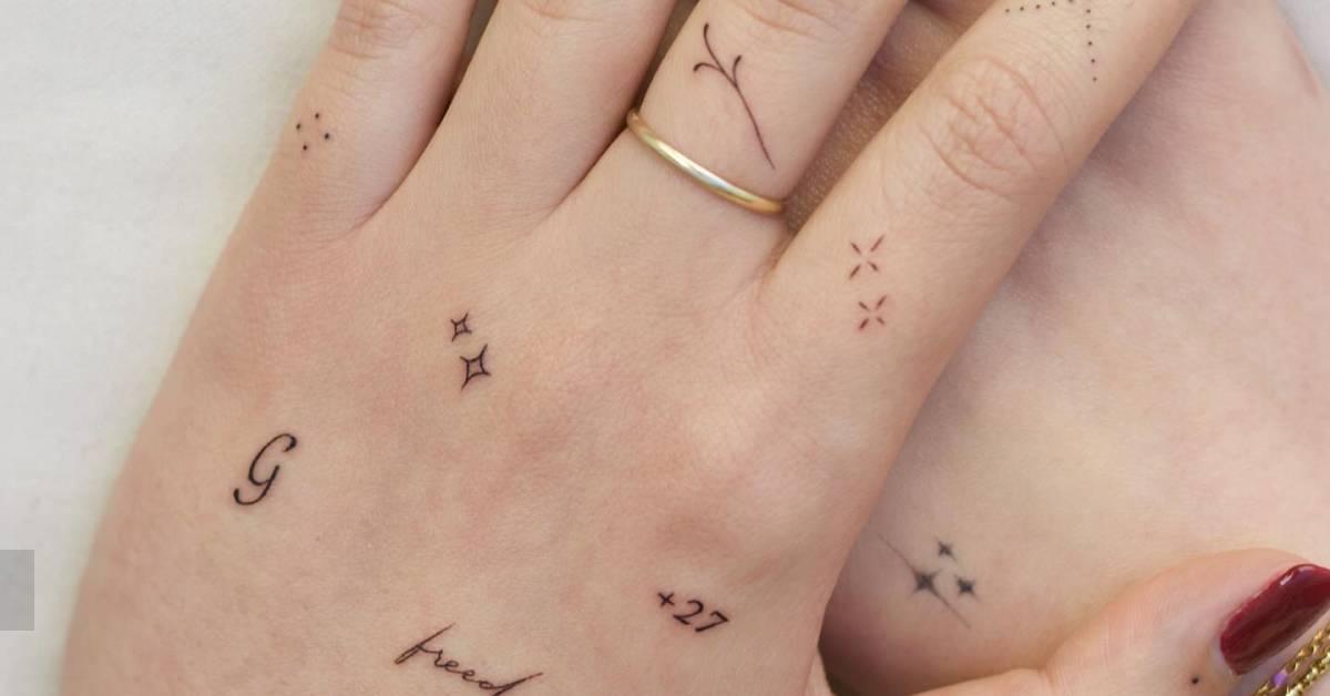 Fine line style hand composition tattoos.