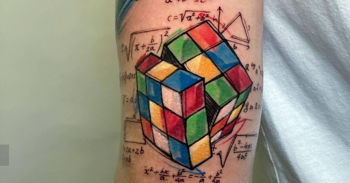 Rubik's cube tattoo in sketch work style placed on the