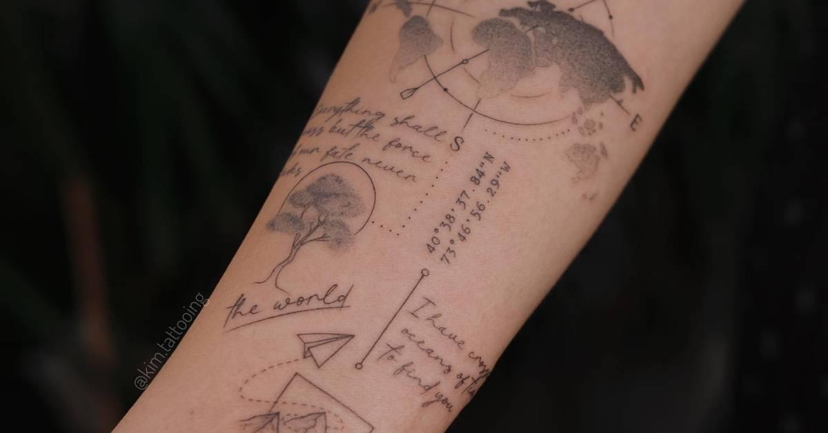 Graphic style travelling themed tattoo located on the