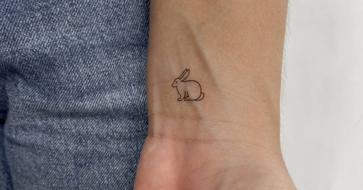 Fine line style rabbit temporary tattoo located on the