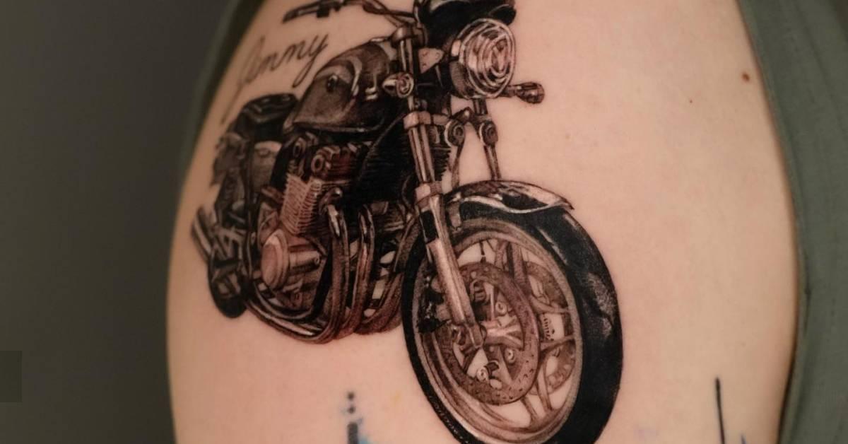 Daddy's Honda tattoo located on the shoulder,