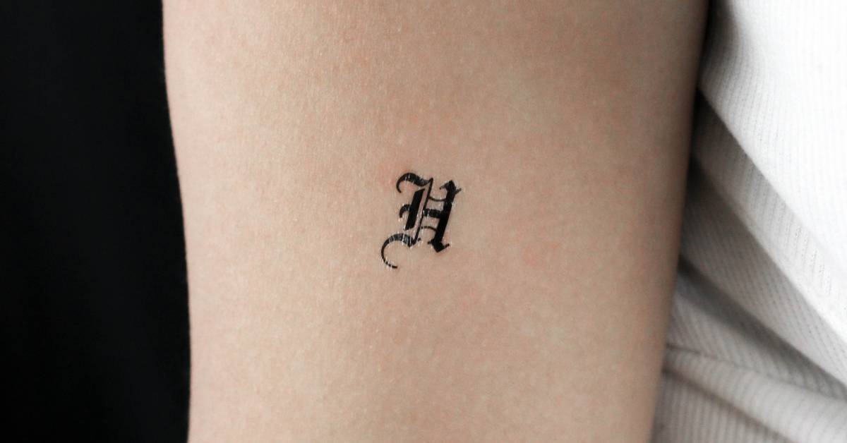Gothic "H" letter temporary tattoo located on the inner