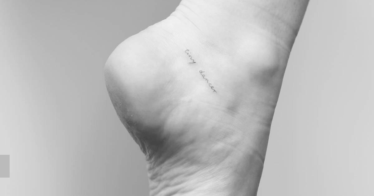 "Tiny dancer" lettering tattoo handwritten on the