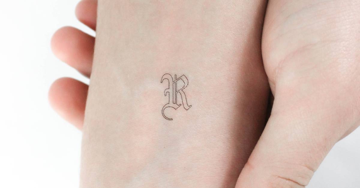Old English "R" letter temporary tattoo done on the