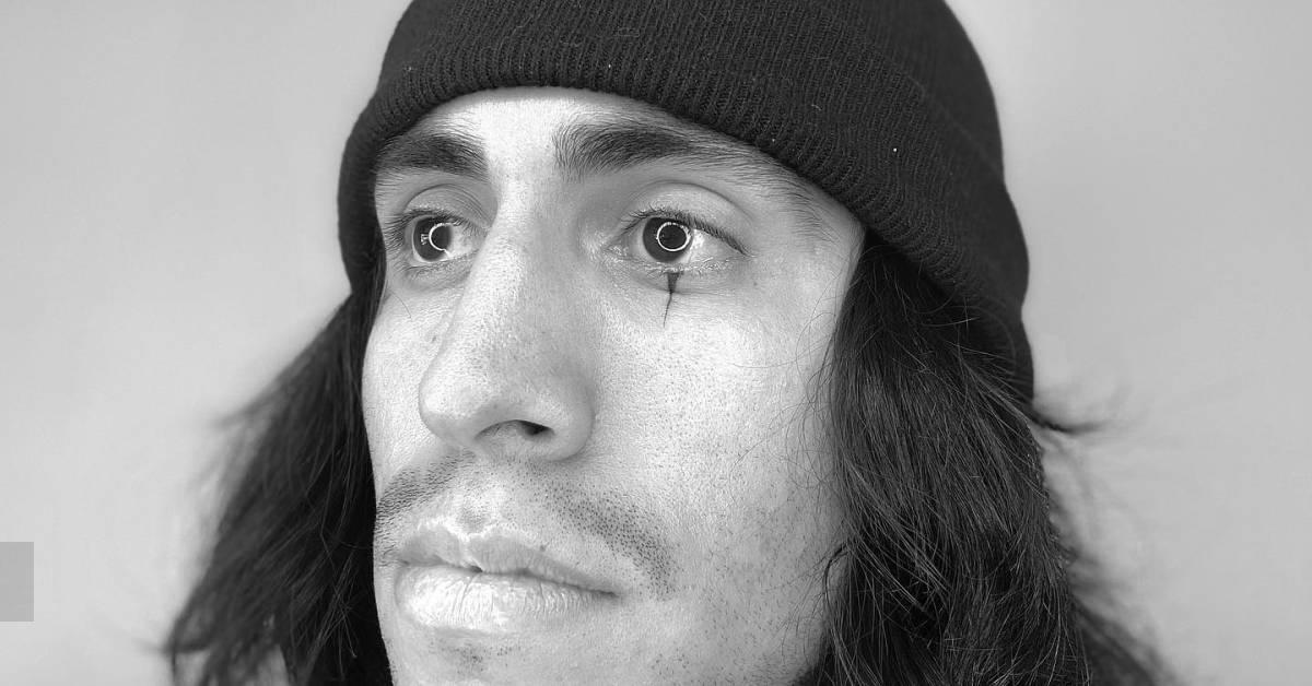 Minimalistic style tear tattoo.