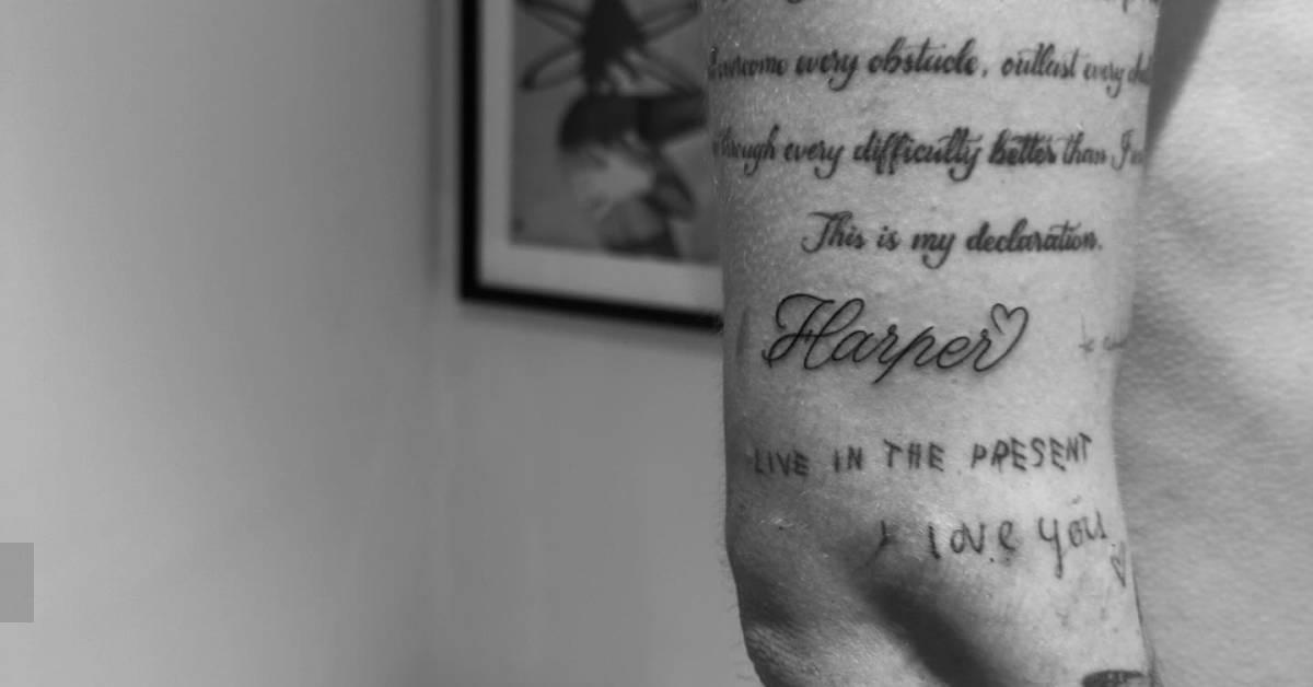"Harper" lettering tattoo located on Romeo Beckham's