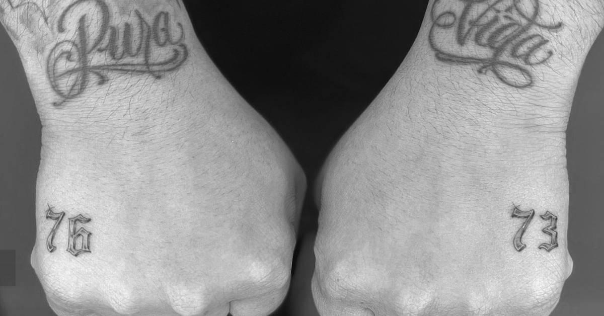 Individual matching "76" and "73" tattoos located on