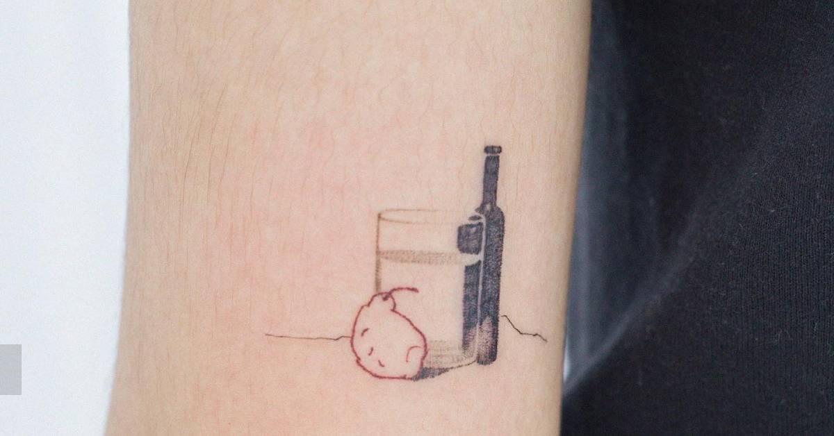 Still life tattoo located on the tricep, watercolor