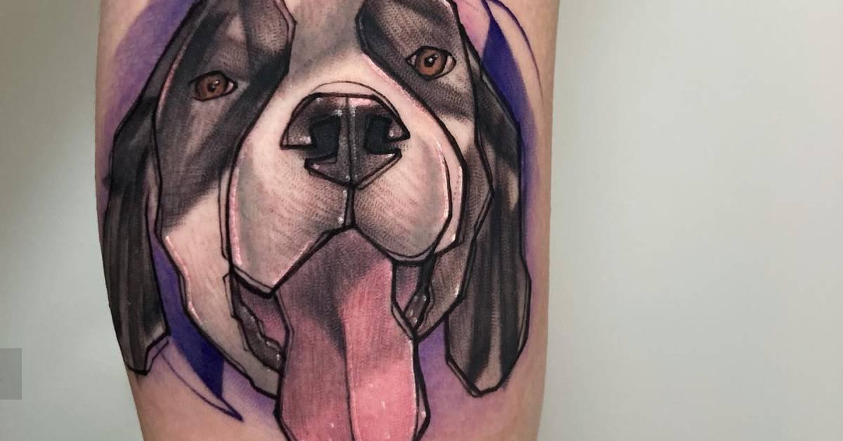 Sketch work style dog portrait tattoo located on the