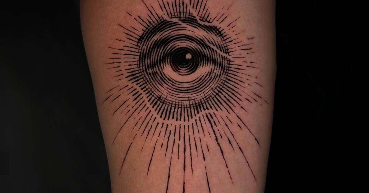 Engraving style eye tattoo located on the inner
