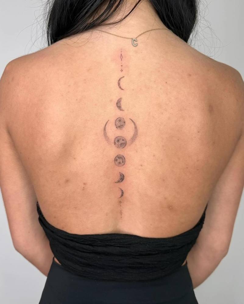 Moon Phases Tattoo Located On The Spine Moon Phases Tattoo Located On The Spine