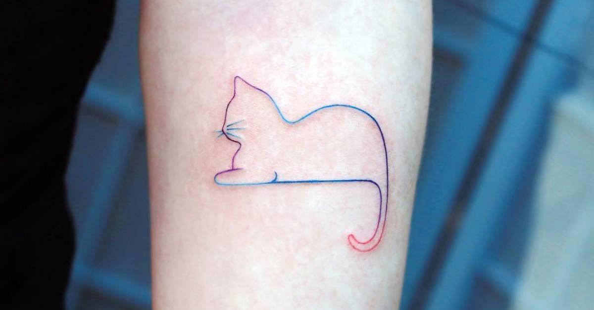 Minimalistic style spectrum cat tattoo located on the