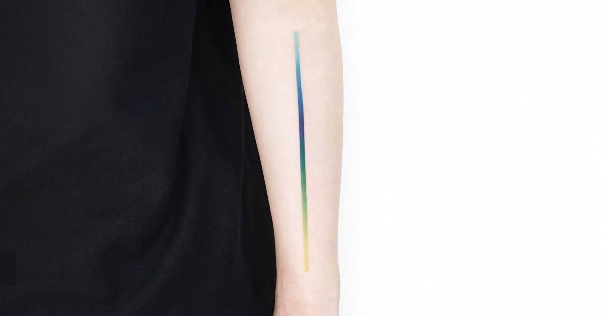 Spectrum line tattoo located on the forearm.