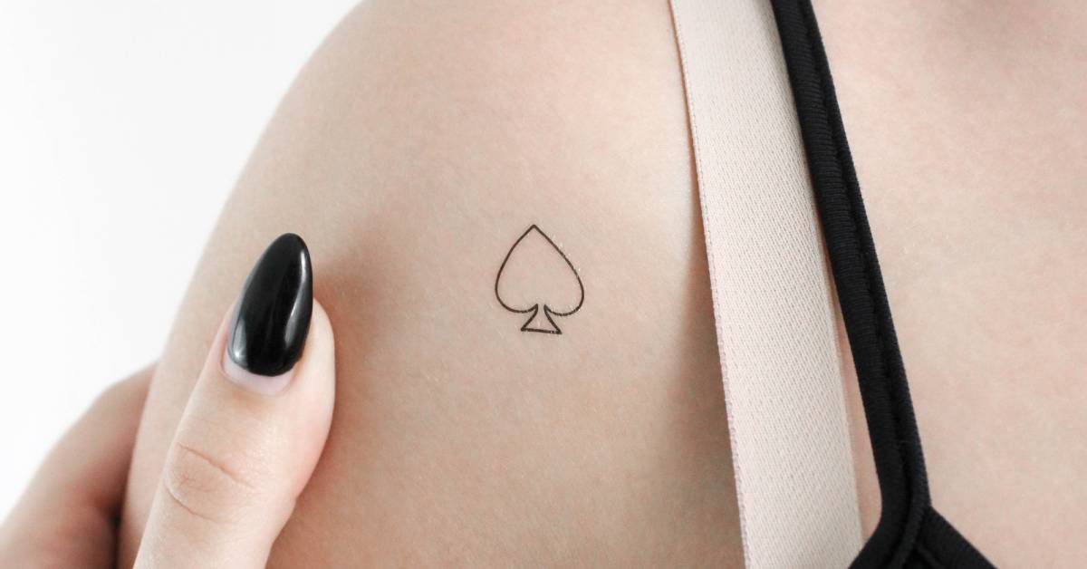 Spades suit outline temporary tattoo done on the