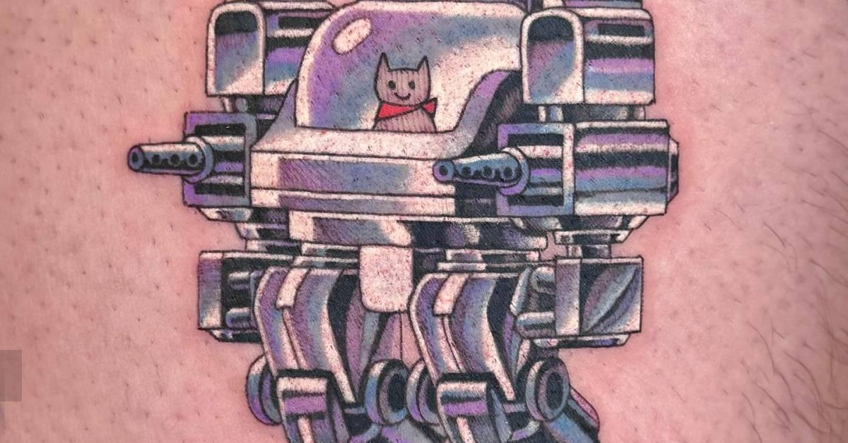 Robot and cat tattoo located on the thigh, cartoon