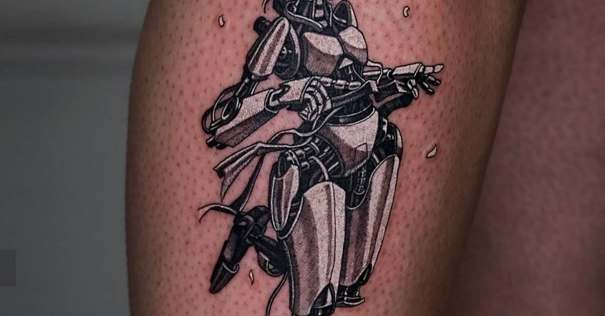 Humanoid robot tattoo located on the shin, comic style.