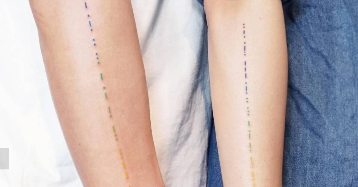 Matching spectrum morse code tattoo for couple.