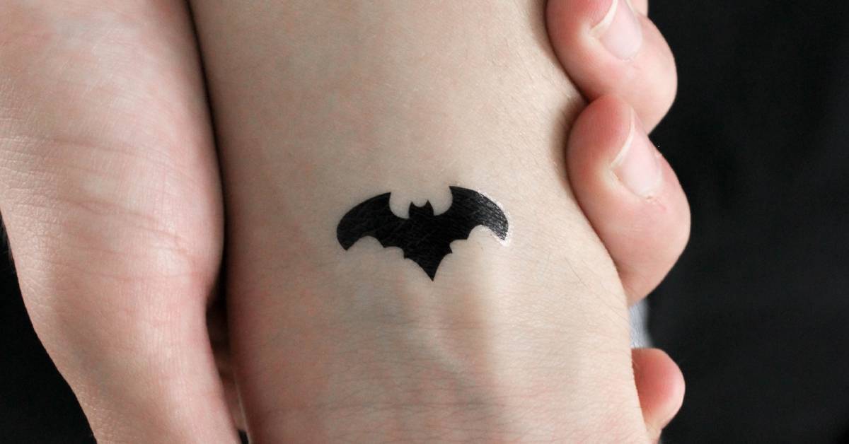 Minimalistic style bat temporary tattoo located on the